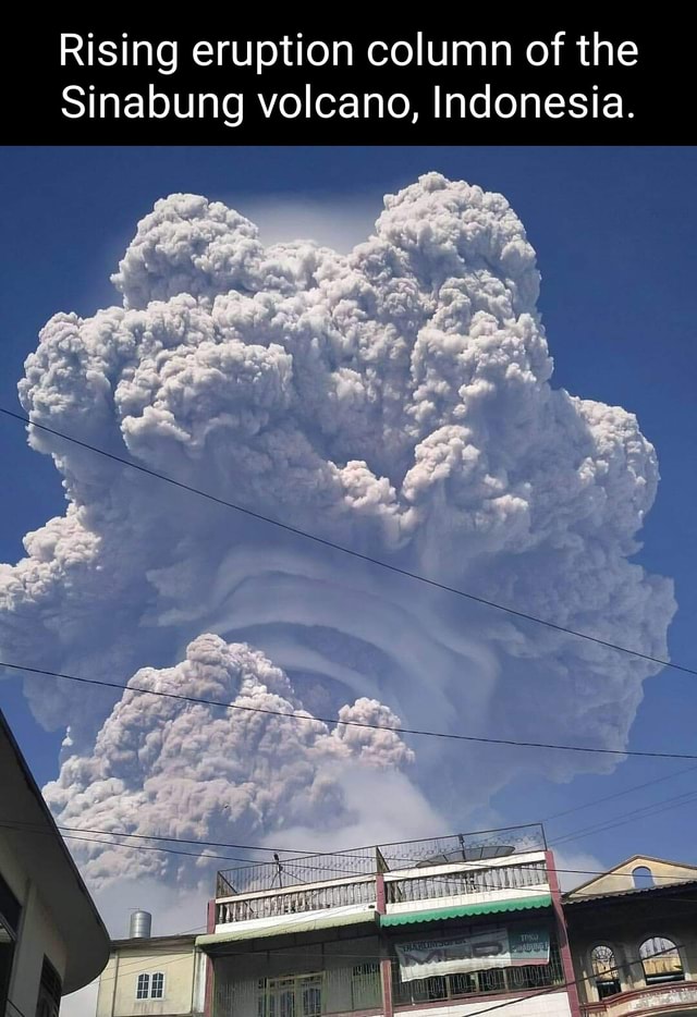 Rising eruption column of the Sinabung volcano, Indonesia. - iFunny