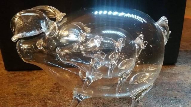 Blown glass pig inside a blown glass pig inside another blown glass pig ...