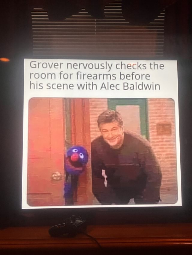 Grover nervously checks the room for firearms before his scene with ...