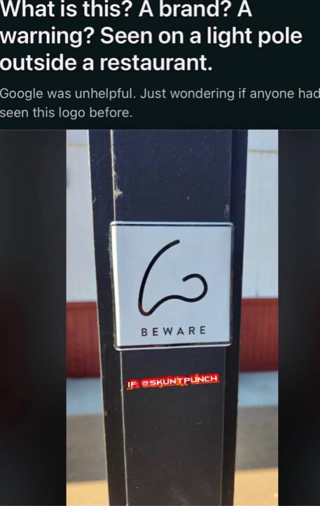 What Is this? A brand? A warning? Seen on a light pole outside a ...