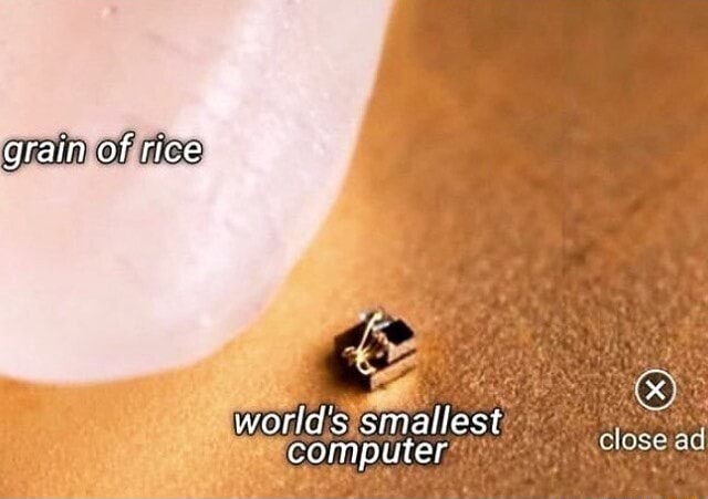 Grain of rice world's smallest computer close ad - )