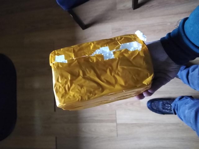 I came home to this bizarre package. A taped up, rather lightweight ...