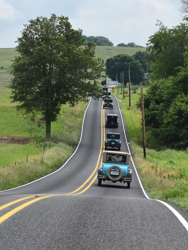 Members of the VCCA cruising an old Indiana back road in their 1928 and ...