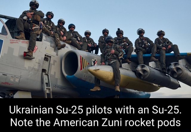 Ukrainian Su-25 pilots with an Su-25. Note the American Zuni rocket ...
