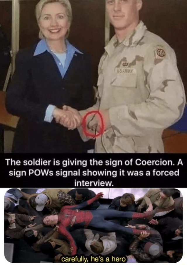 The soldier ls giving the sign of Coercion. A sign POWs signal showing ...
