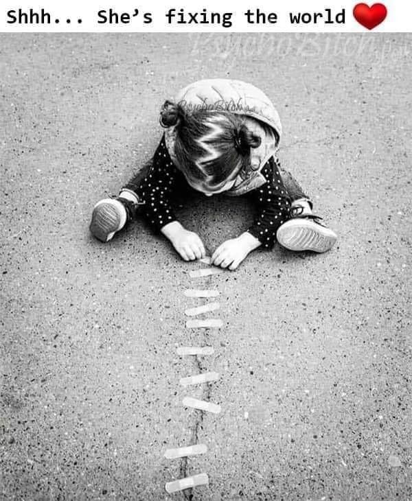 Shhh... She's fixing the world - America’s best pics and videos