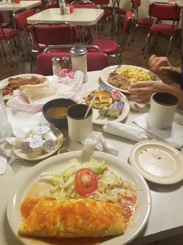 Order of guayin and huevos a la mexicana with a side of bacon and ...