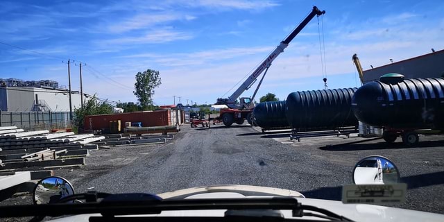 At the loading place. Today I'll be hauling one of them new tanks for a ...