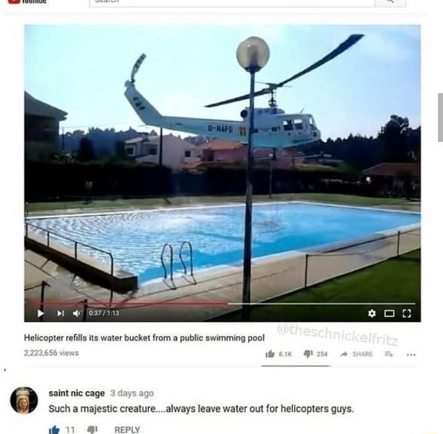 Ot_ Helicopter refills its water bucket from a public swimming pool ow ...
