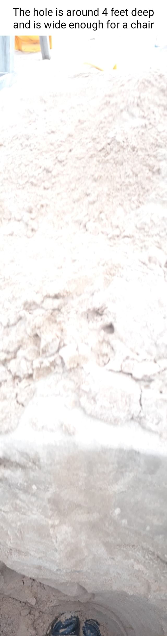 The hole is around 4 feet deep and is wide enough for a chair ten