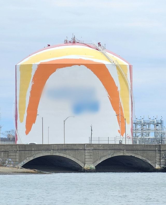 The Rainbow Swash, painted on a 140-foot-tall tank in Dorchester, is ...