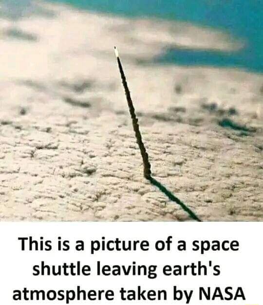 This is a picture of a space shuttle leaving earth's atmosphere taken ...