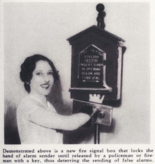 Demonstrated above is a new fire signal box that locks the hand of ...