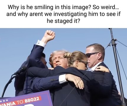 Why is he smiling in this image? So weird... and why arent we ...