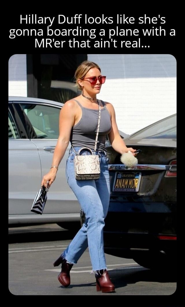 Hillary Duff looks like she's gonna boarding a plane with a MR'er that ain't real... - iFunny