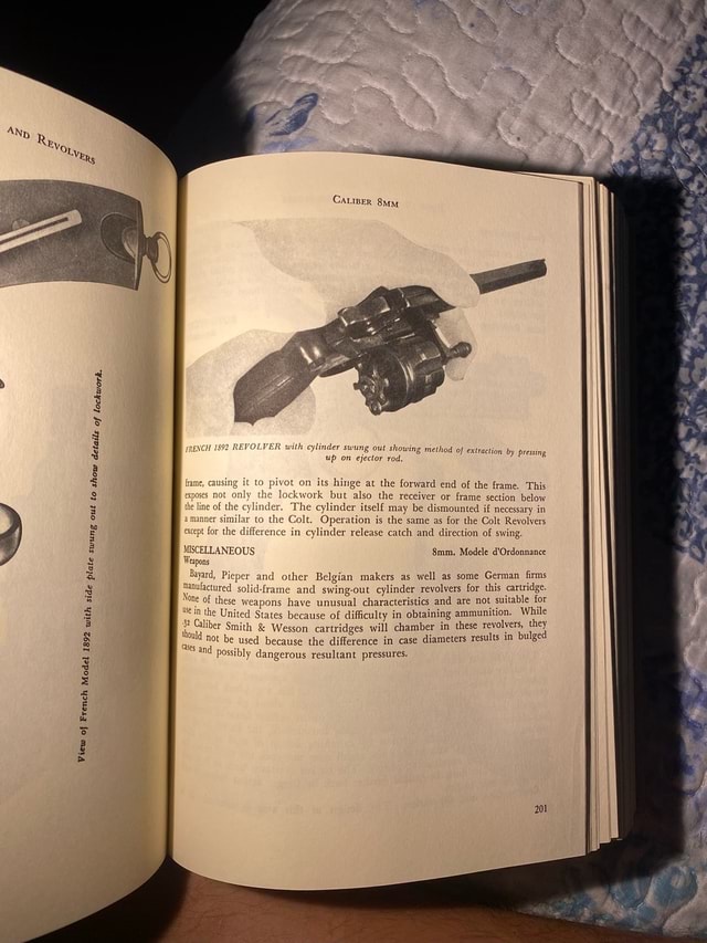 CALIBER ENCH 1992 REVOLVER with cylinder swung out showing method of ...