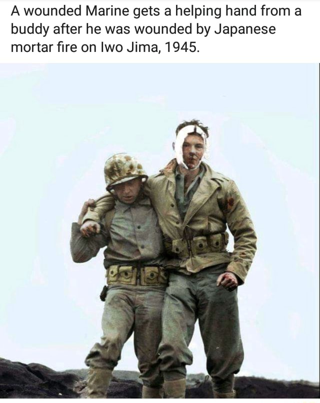 A wounded Marine gets a helping hand from a buddy after he was wounded ...