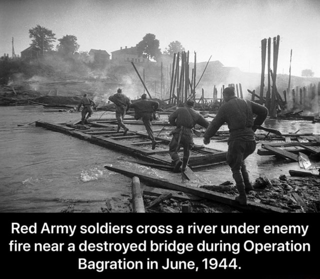 Red Army soldiers cross a river under enemy fire near a destroyed ...