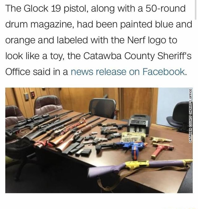 It’s nerf or nothin’ - The Glock 19 pistol, along with a 50-round drum ...