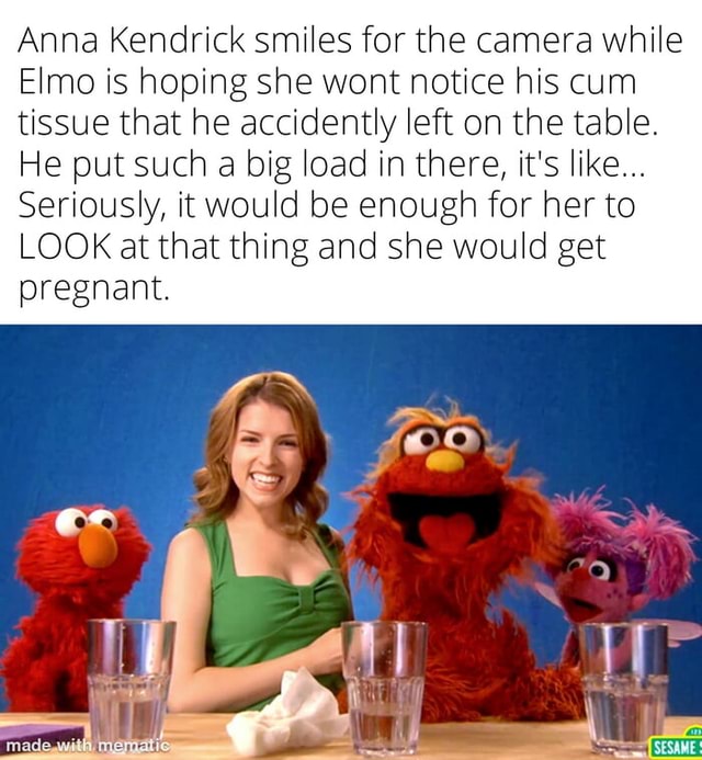 Anna Kendrick smiles for the camera while Elmo is hoping she wont ...
