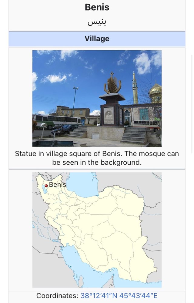 Benis Village Statue in village square of Benis. The mosque can be seen ...