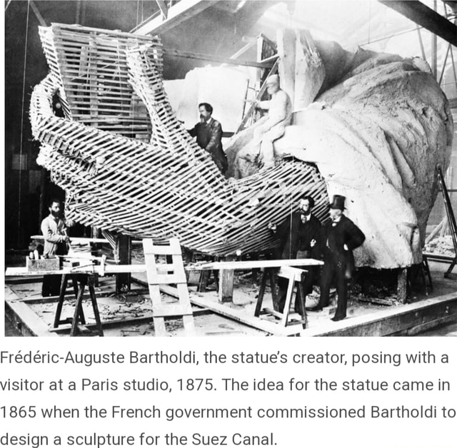 Frederic Auguste Bartholdi, the statue's creator, posing with a visitor ...