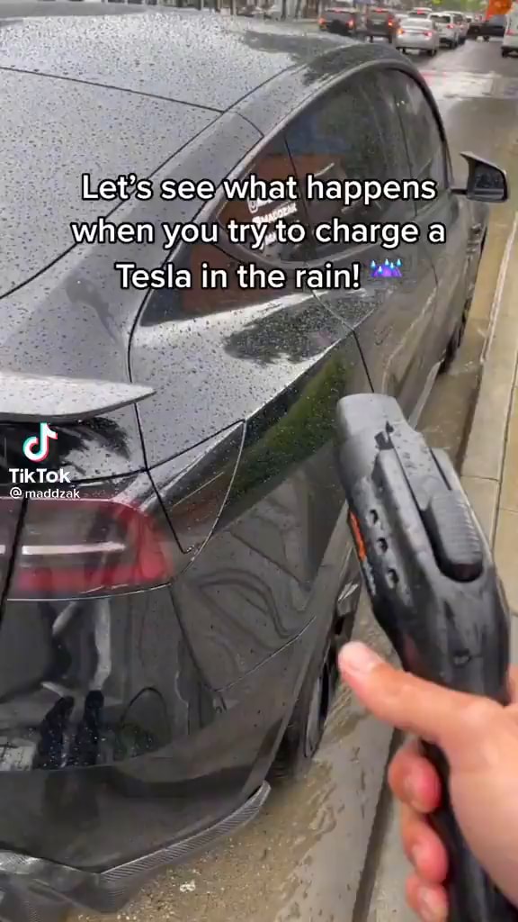 Let's see what happens when you charge a Tesla in the rain! TikTok - iFunny