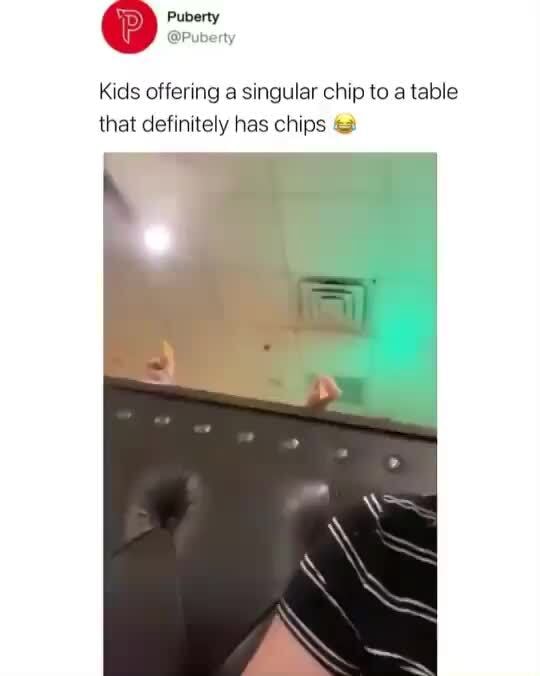 Puberty @Puberty Kids offering a singular chip to a table that ...