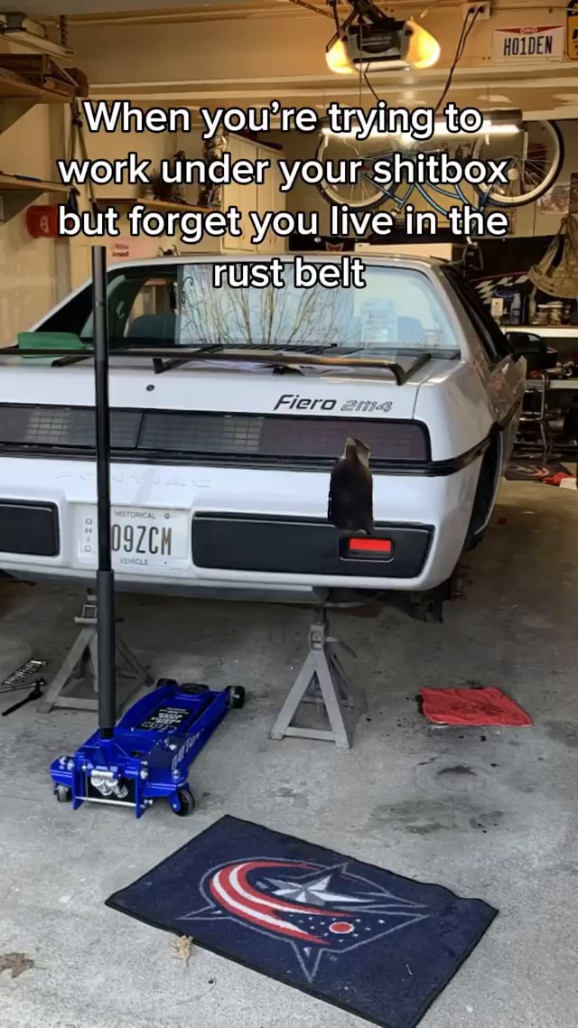 HOLDEN When you trying to. work under your shitbox but forget you live ...