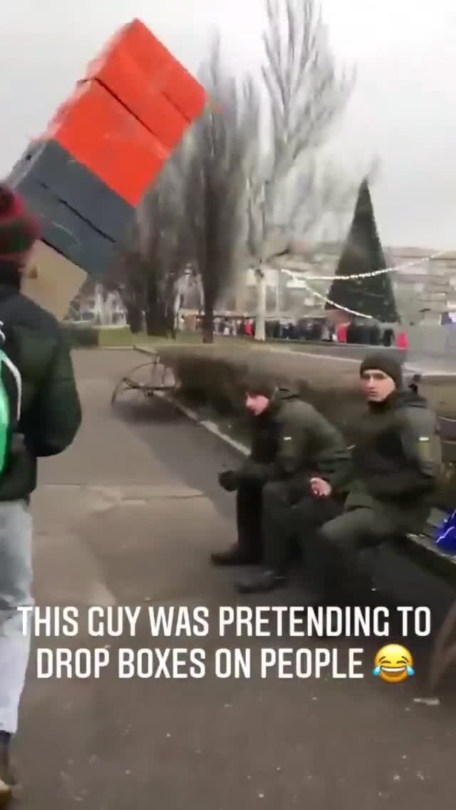 IS GUY WAS PRETENDING TO DROP BOXES ON PEOPLE - iFunny