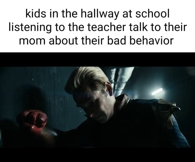 Kids in the hallway at school listening to the teacher talk to their ...