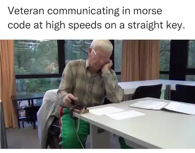 Veteran communicating in morse code at high speeds on a straight key ...