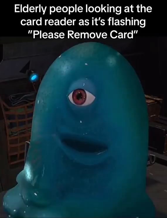 Elderly people looking at the card reader as it's flashing "Please ...