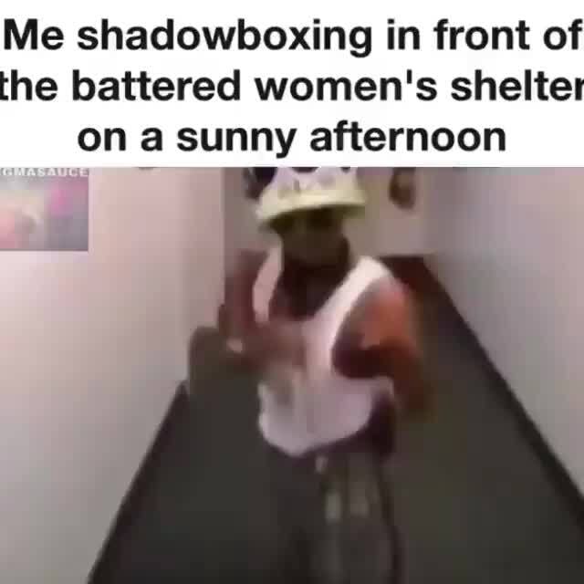 Me shadowboxing in front of the battered women's shelter on a sunny ...