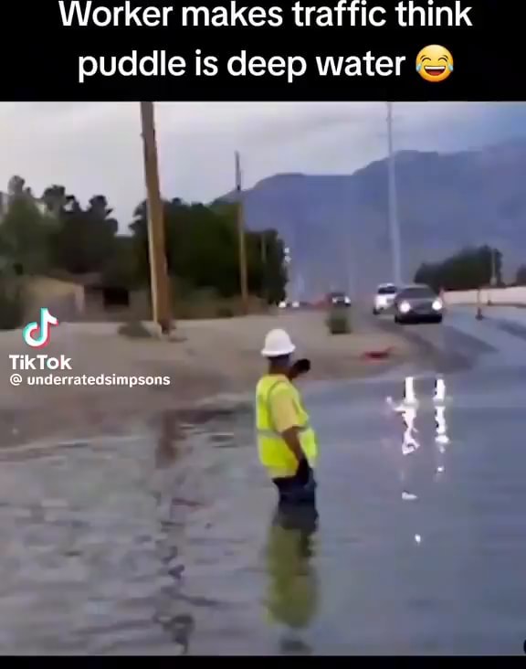 Worker makes traffic think puddle is deep water - cf TikTok ...