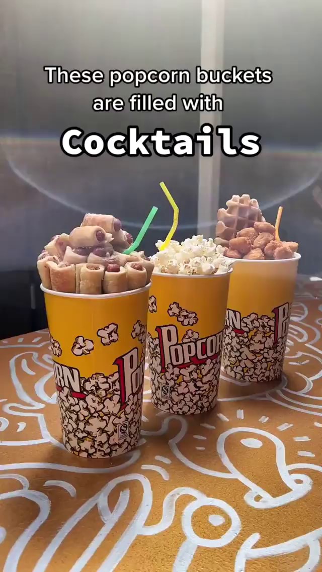 These popcorn buckets are filled with Cocktails - iFunny