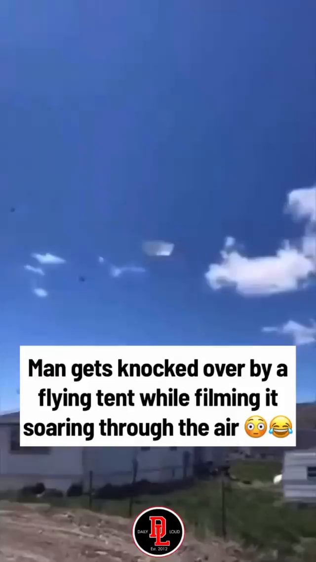 Man gets knocked over by a flying tent while filming it soaring through ...
