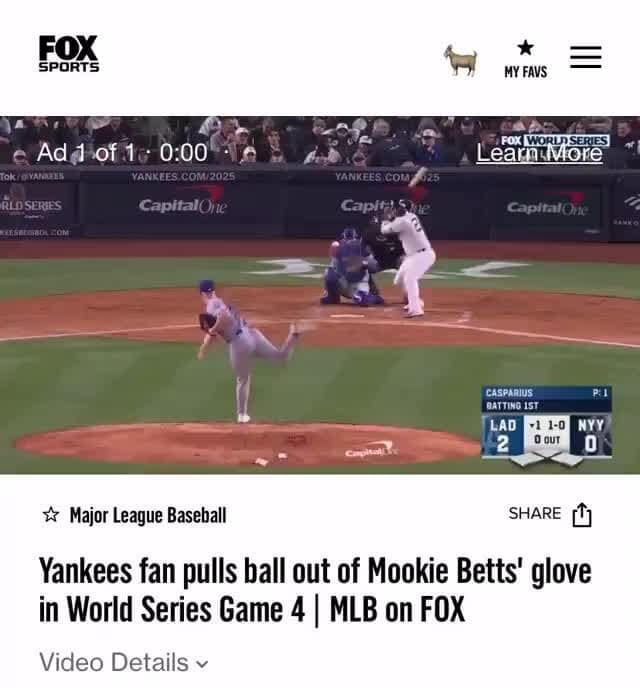 SPORTS MY FAVS Aa More tr Major League Baseball SHARE Yankees fan pulls ball out of Mookie Betts ...