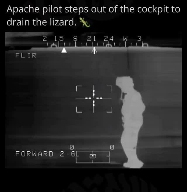 Apache pilot steps out of the cockpit to drain the lizard. FLIR bo I ...